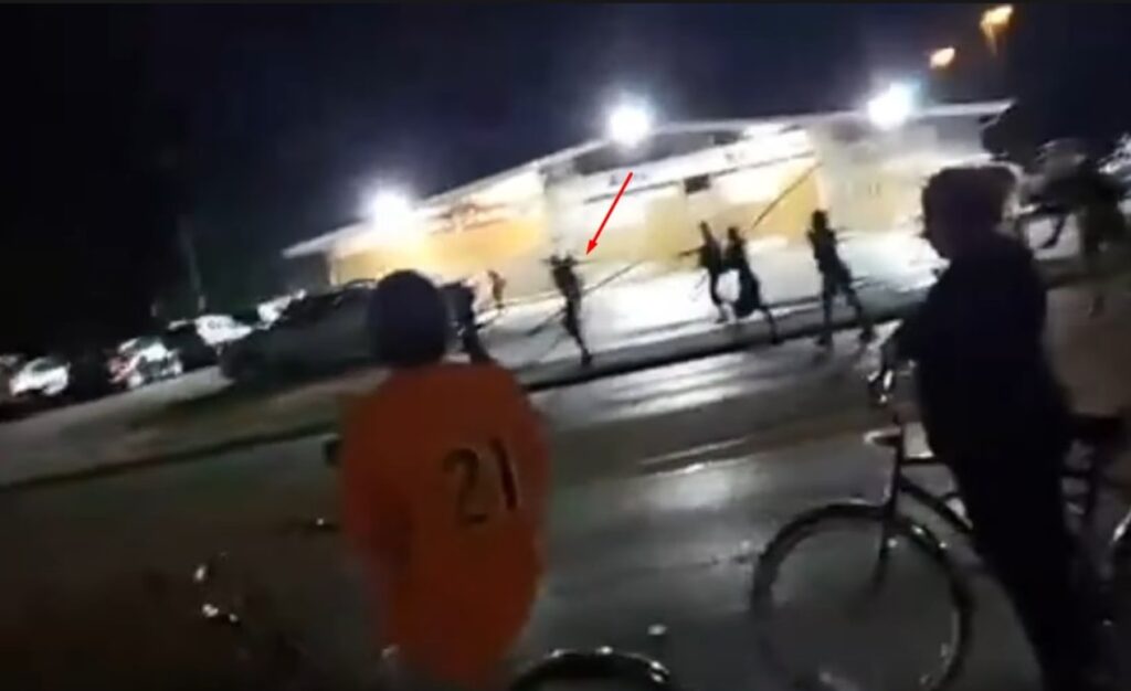 PHOTO Joseph Rosenbaum Raising His Hands At Kyle Rittenhouse Telling ...