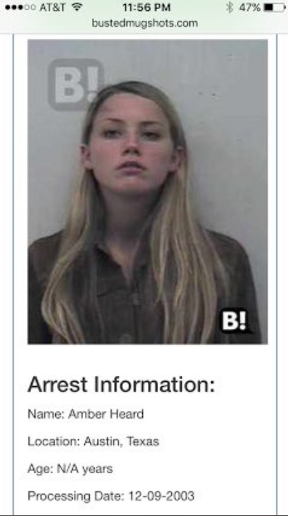 PHOTO Amber Heard Looks Crazy AF In Her 2003 Mugshot In Austin Texas