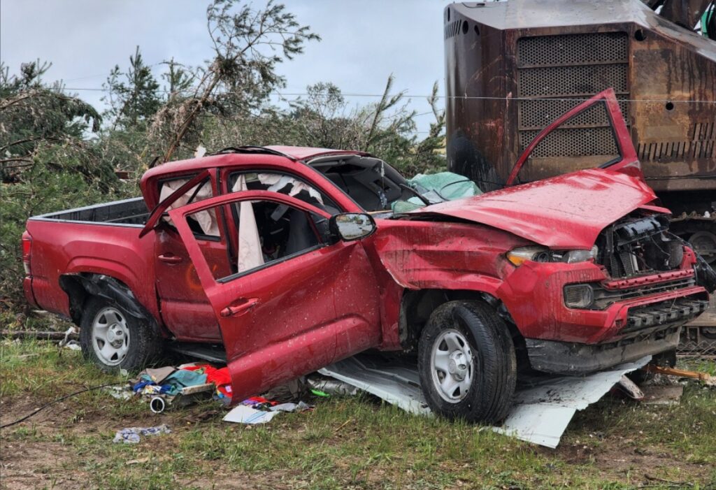 PHOTO Dozens Of Cars Trucks RV's And Semi-Trucks Smashed Beyond Repair ...