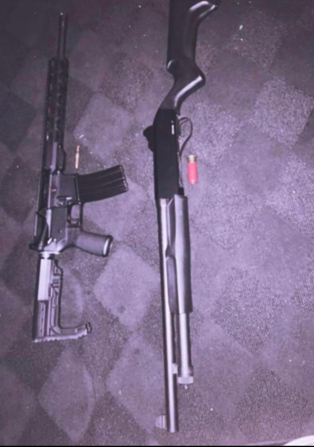 PHOTO Close Up Of Ethan Miller's AR-15 Rifle And 12 Gauge Pump Action ...