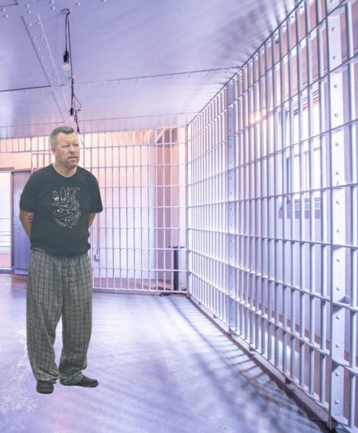 PHOTO Paul Flores Standing In His Pajamas Looking At The Jail Cell That ...