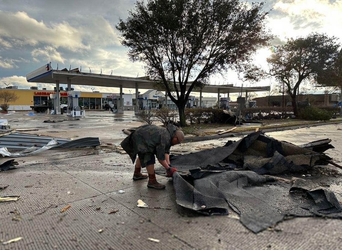 PHOTO Chevron Sign Laying In Parking Lot Of Gas Station That Got ...