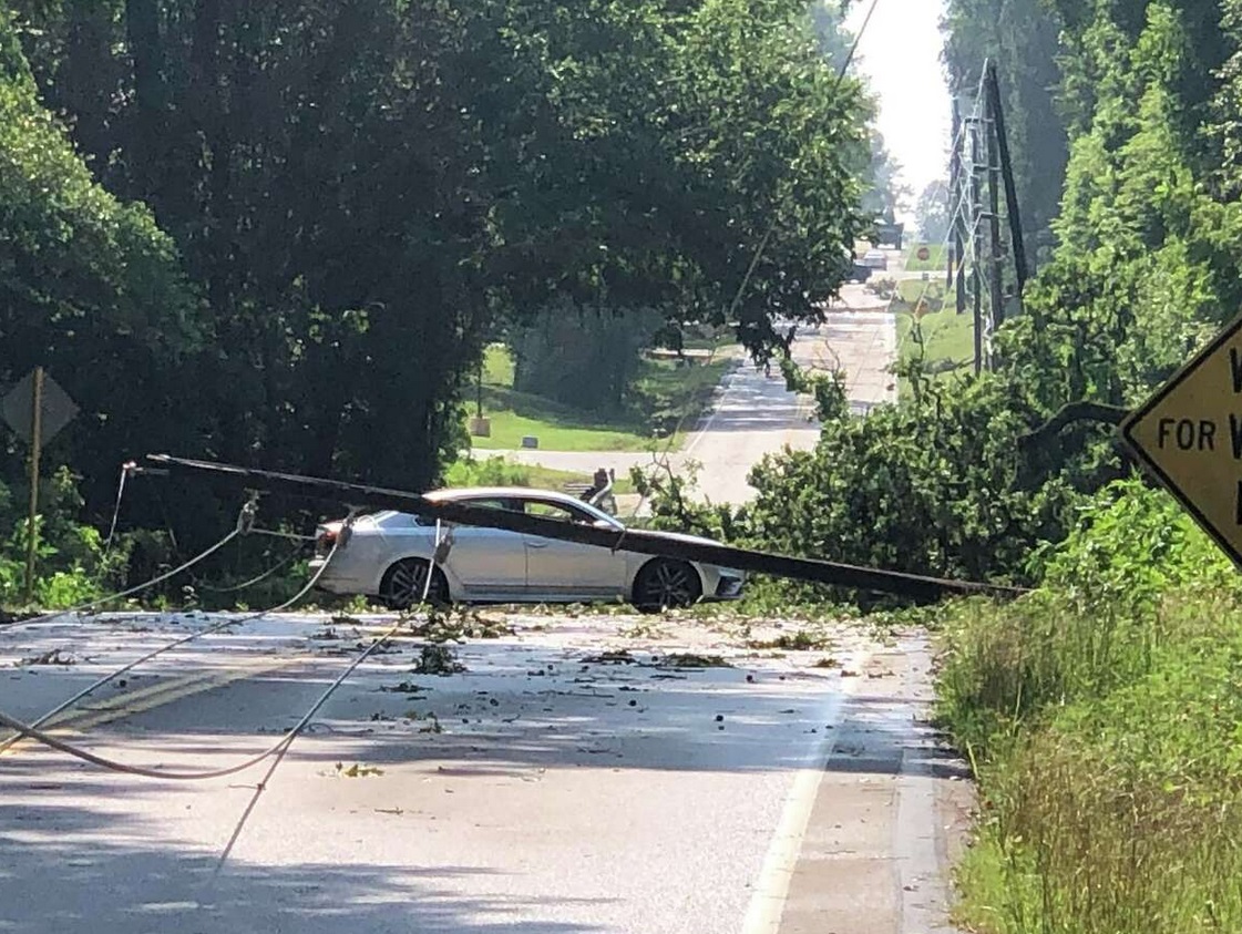 PHOTO Power Lines Laying In The Street Blocking The Road In Conroe Texas