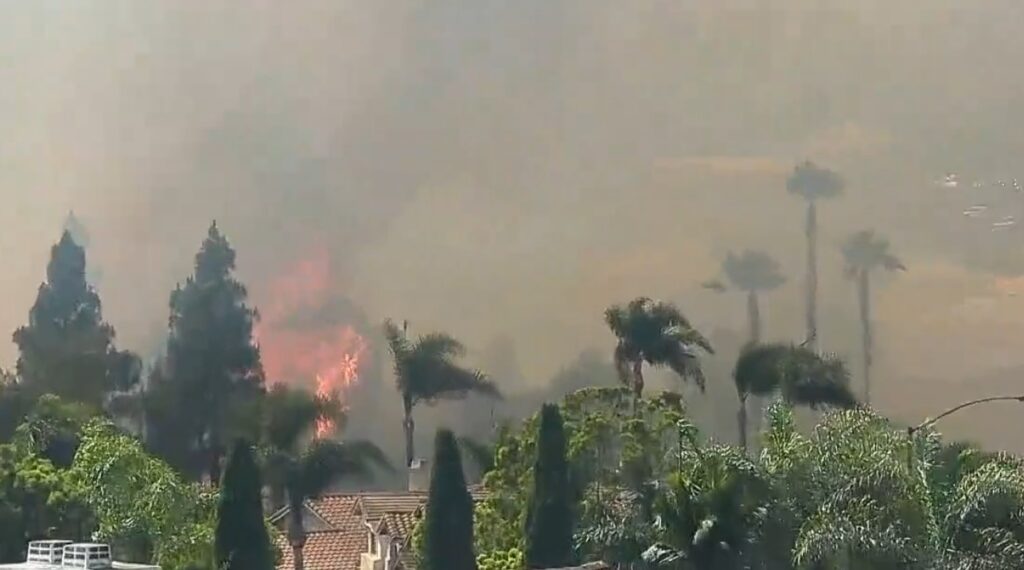 PHOTO Heavy Flames Just Above Houses In Oceanside California From Fire