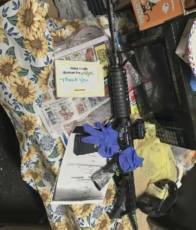 PHOTO Ryan Palmeter's Automatic Gun With Plastic Gloves On Table