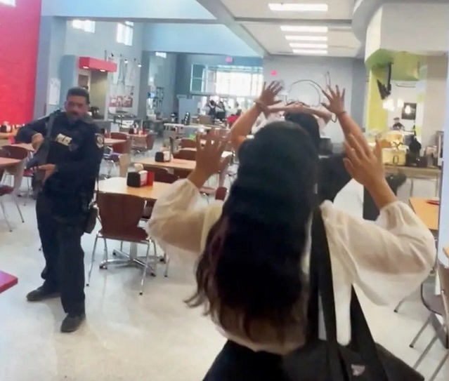 PHOTO Students In UNLV Classroom Putting Their Hands Up As Police Clear ...