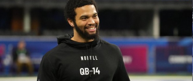 PHOTO Caleb Williams Boldly Wearing QB 14 Hoodie