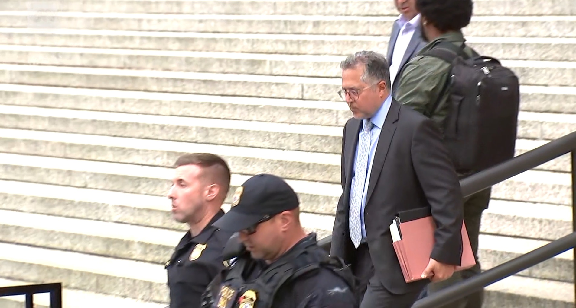 PHOTO Luigi Mangione's Attorney Walking Calmly Into Court With A Huge ...