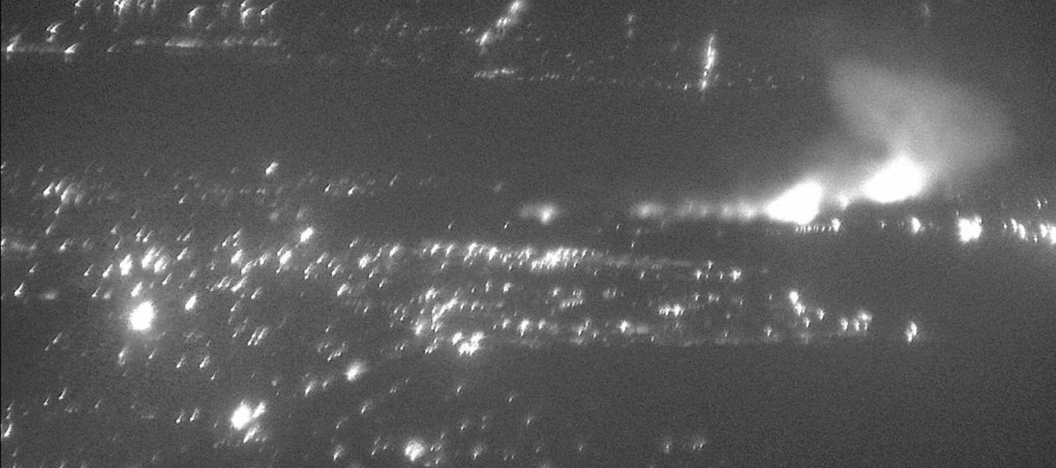 PHOTO Clay Fire Sending Embers Across River Bottom Moving Towards Buildings