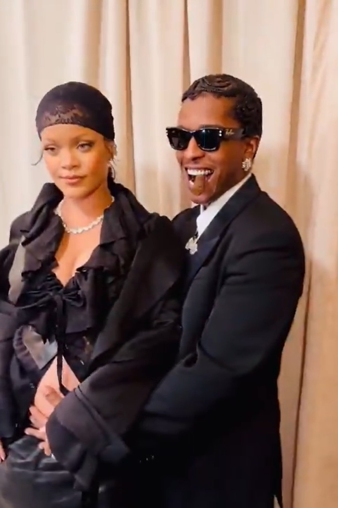 PHOTO ASAP Rocky Holding Rihanna's Baby Bump With A Cigar In His Mouth