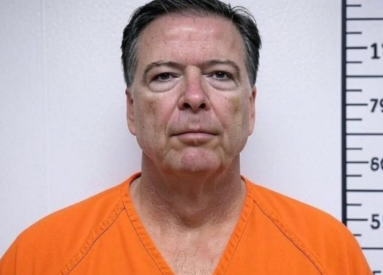 PHOTO James Comey In Orange Jumpsuit Taking Mugshot