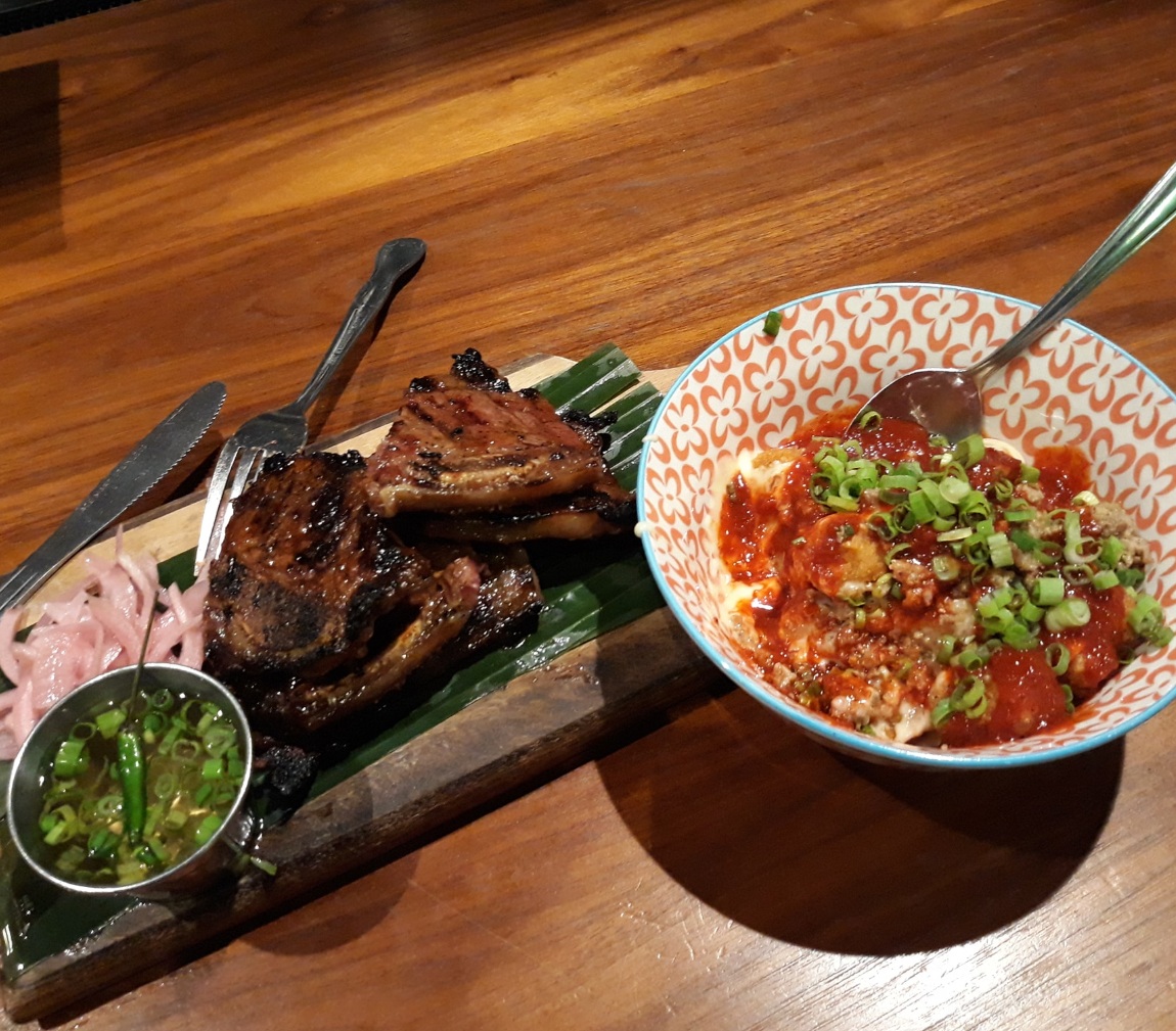 PHOTO Ethan Nieneker Eating Filipino Barbecue Ribs In Austin Texas