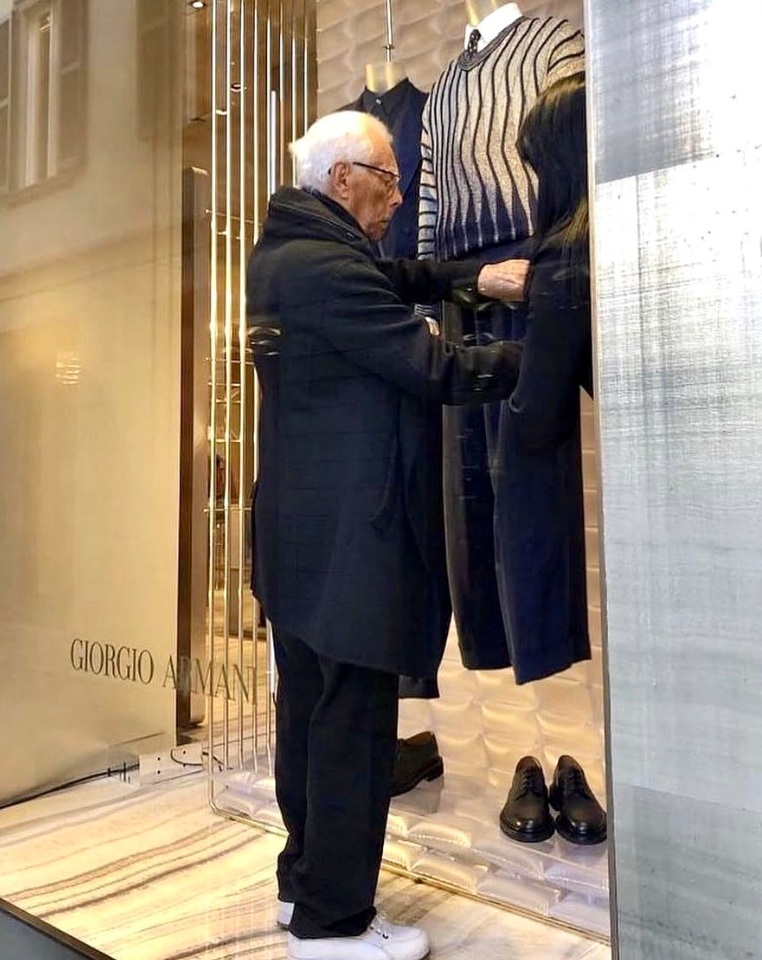 PHOTO Giorgio Armani Spotted In Milan Italy Personally Arranging His Own Boutique Window