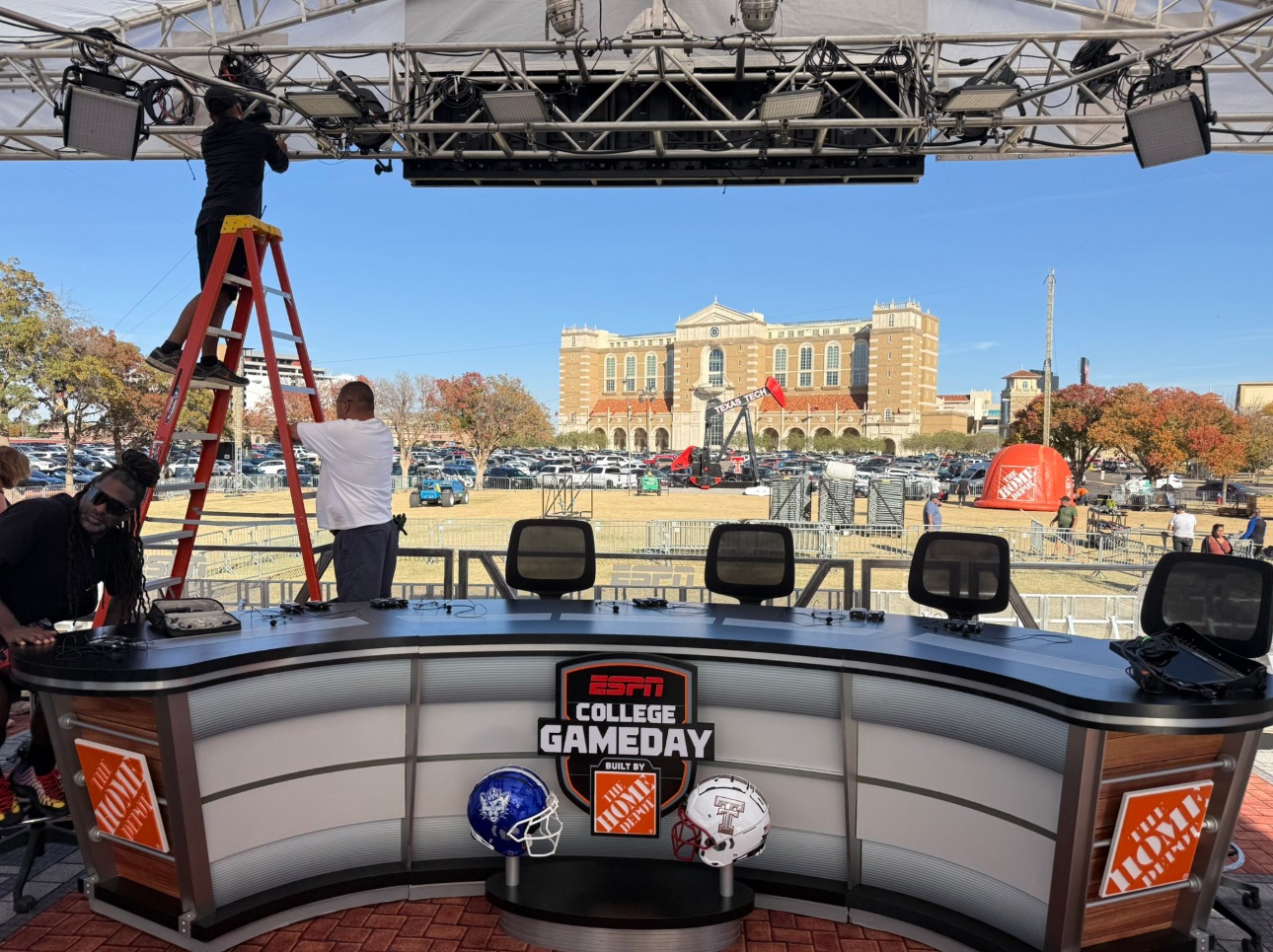PHOTO College Gameday Desk Setup In Green Space Outside Jones AT&T Stadium