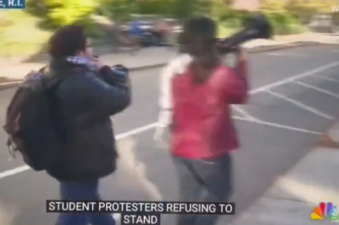 PHOTO Mustapha Kharbouch Caught On NBC News Protesting In The Streets
